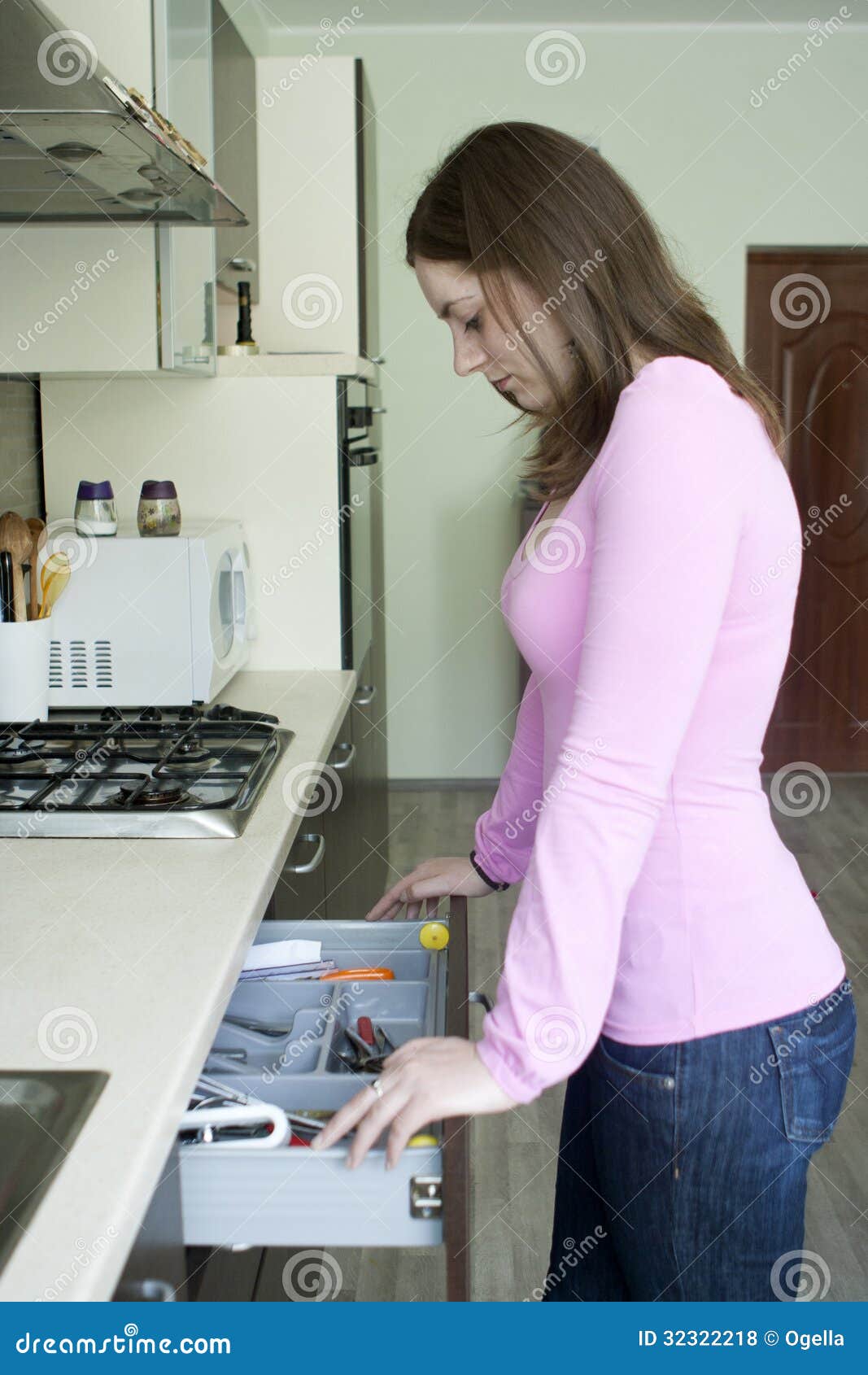 Attractive Girl in Pink Blouse on the Kitchen Stock Photo - Image of ...