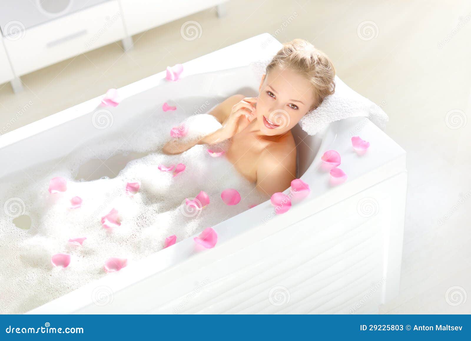 An Attractive Girl Relaxing In Bath Stock Image - Image: 29225803