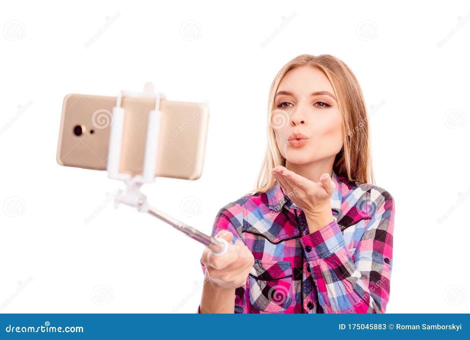 Attractive Girl Sending Air Kiss And Making Photo With Selfie Stick