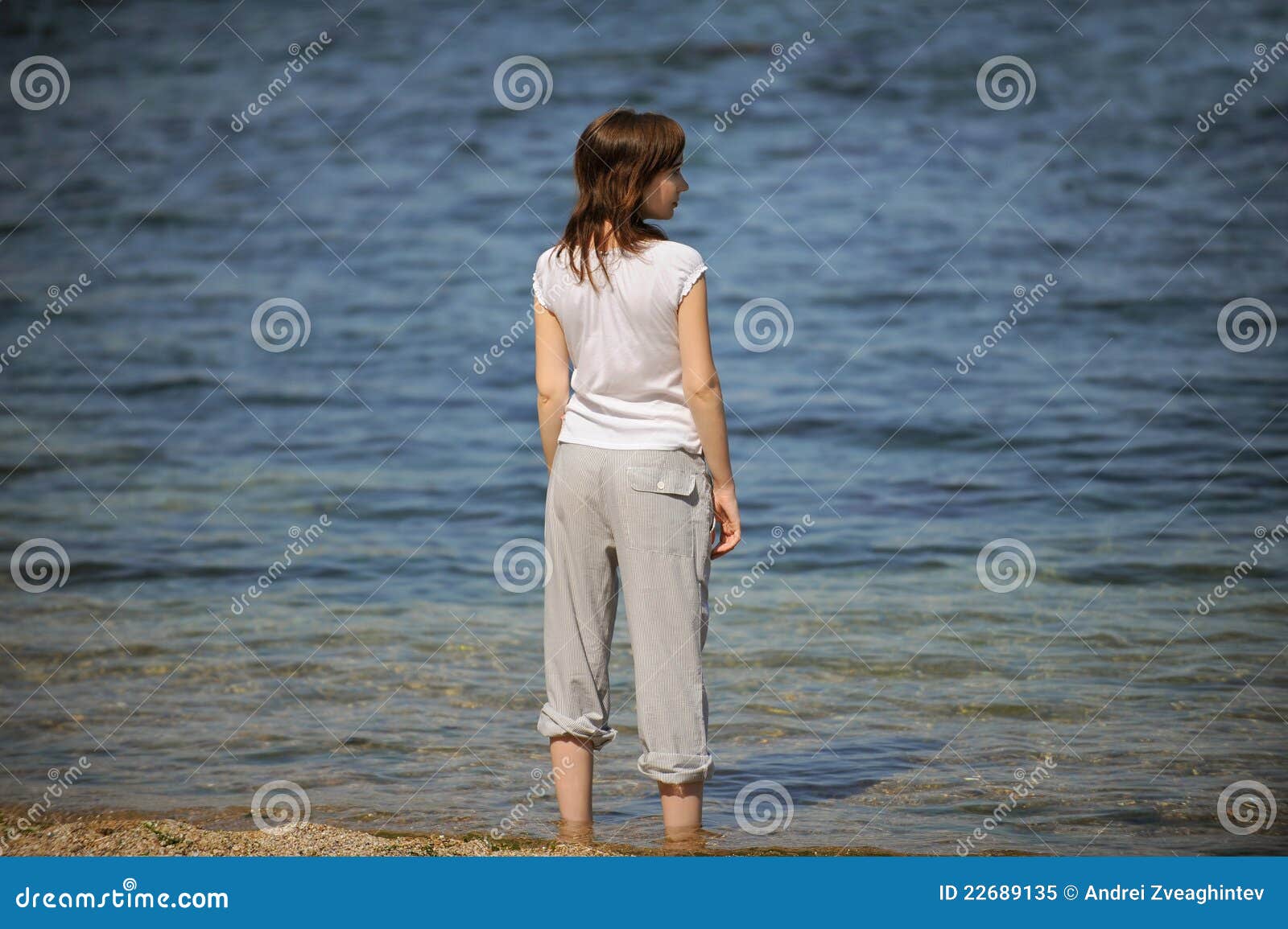 Attractive girl in a water stock image. Image of outdoors - 22689135