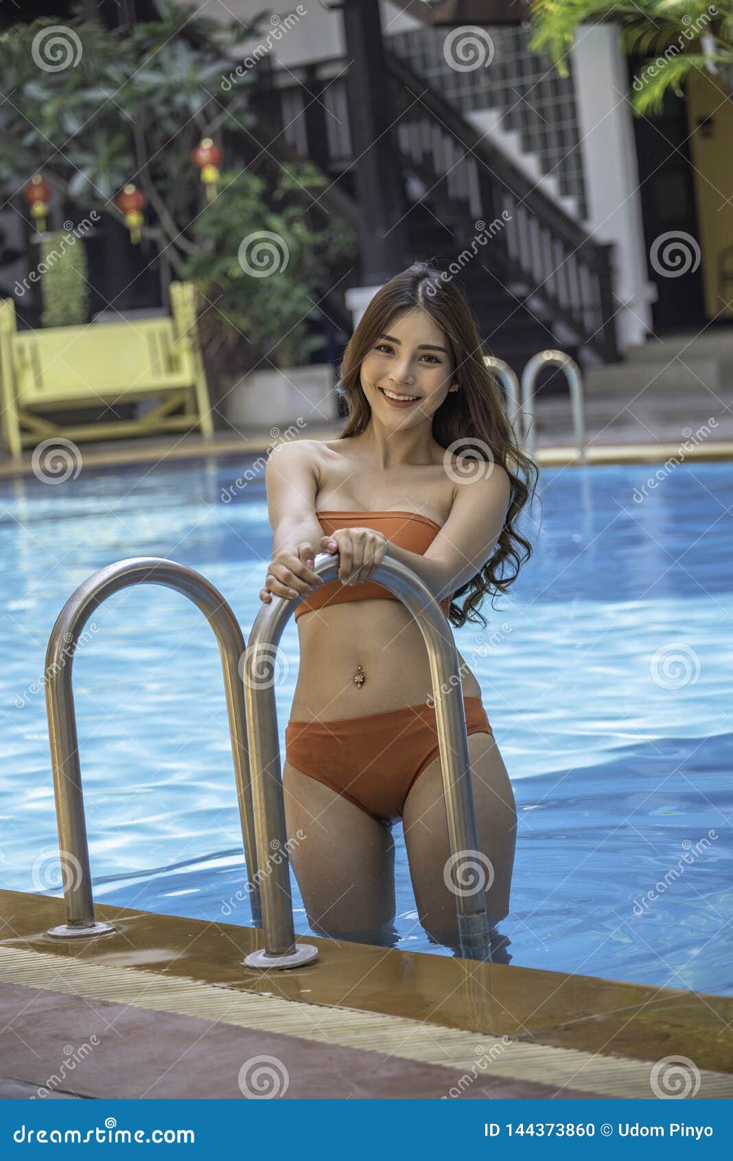 Woman Wearing Elegant Bikini Posing beside Swimming Pool. Stock Photo ... Woman Wearing Elegant Bikini Posing beside Swimming Pool. Stock Photo ...