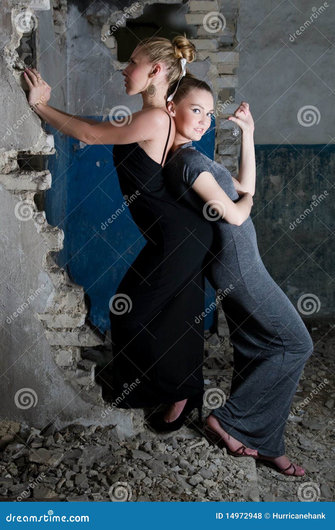 Attractive Girls in Dresses Posing in the Slums Stock Photo - Image of ...