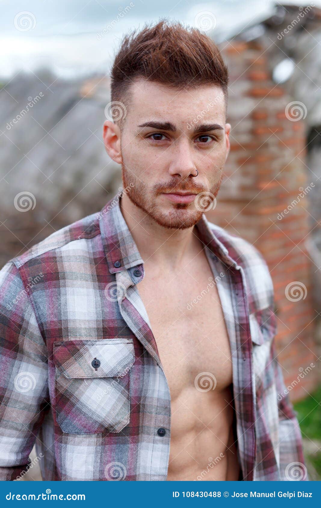 Attractive Guy Showing His Muscles Stock Photo - Image of outdoor ...