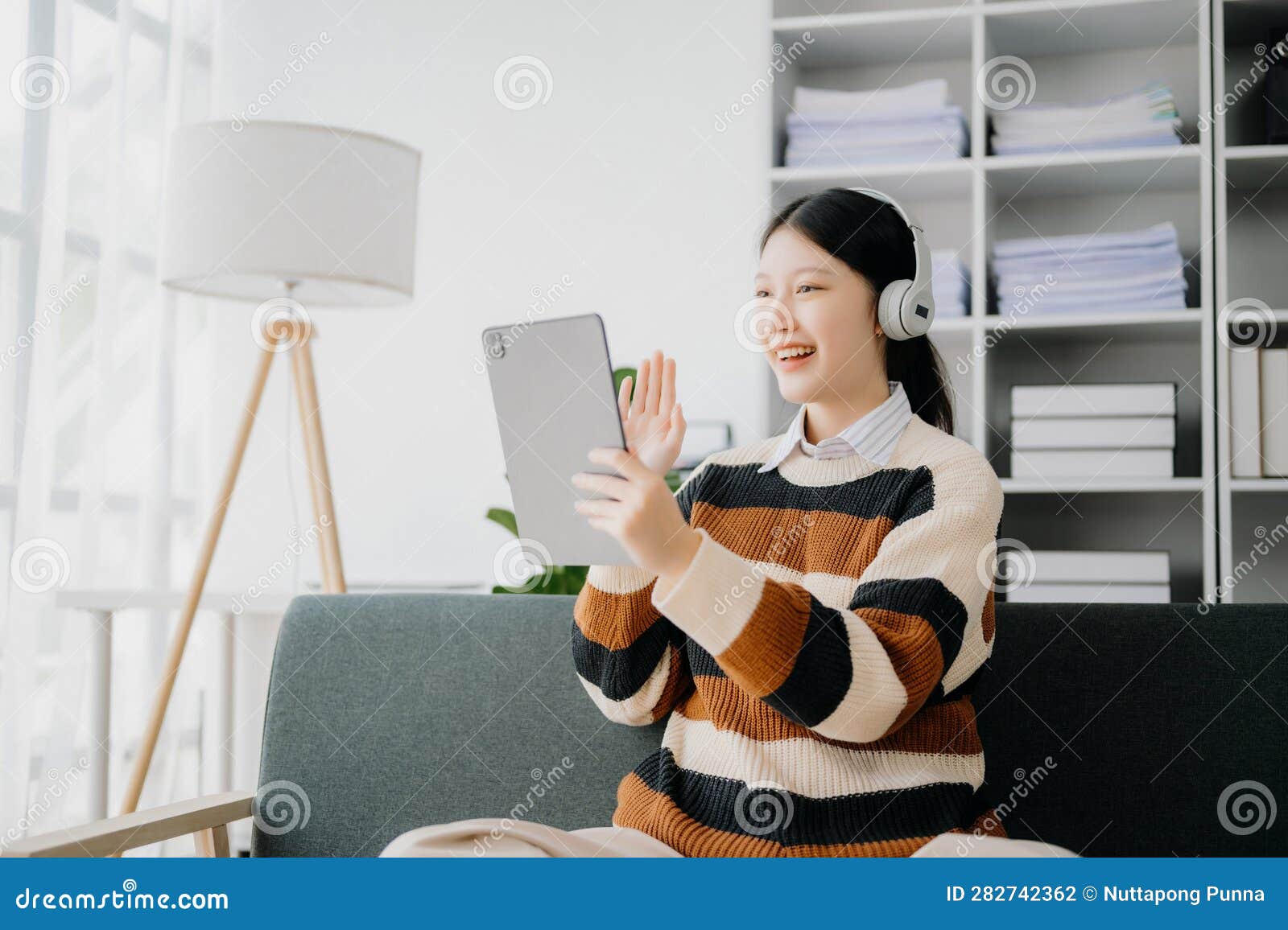 Attractive Happy Young Asian Student Studying at the College Library ...