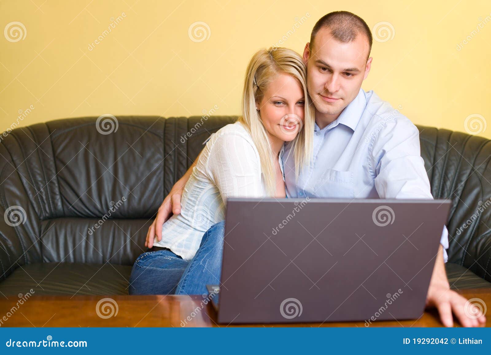 Attractive Happy Young Couple with Laptop. Stock Photo - Image of ...