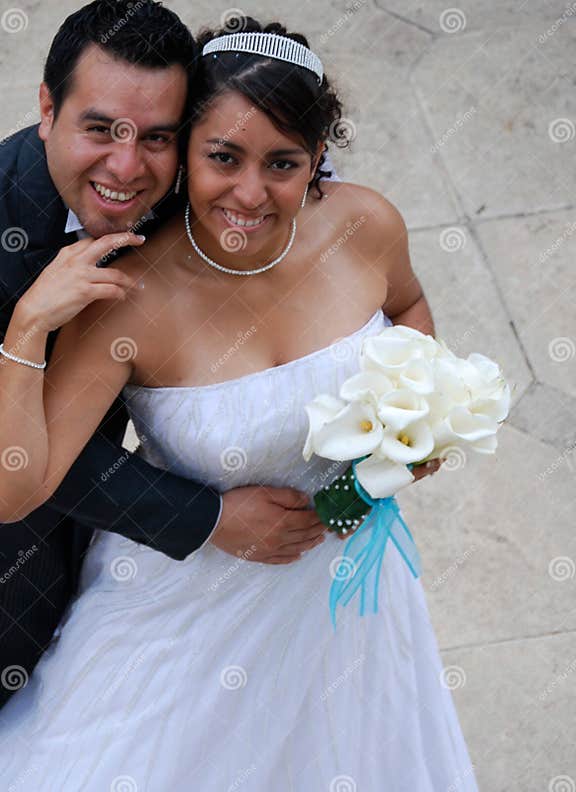 Attractive Hispanic Bride and Groom Stock Photo - Image of carrying ...