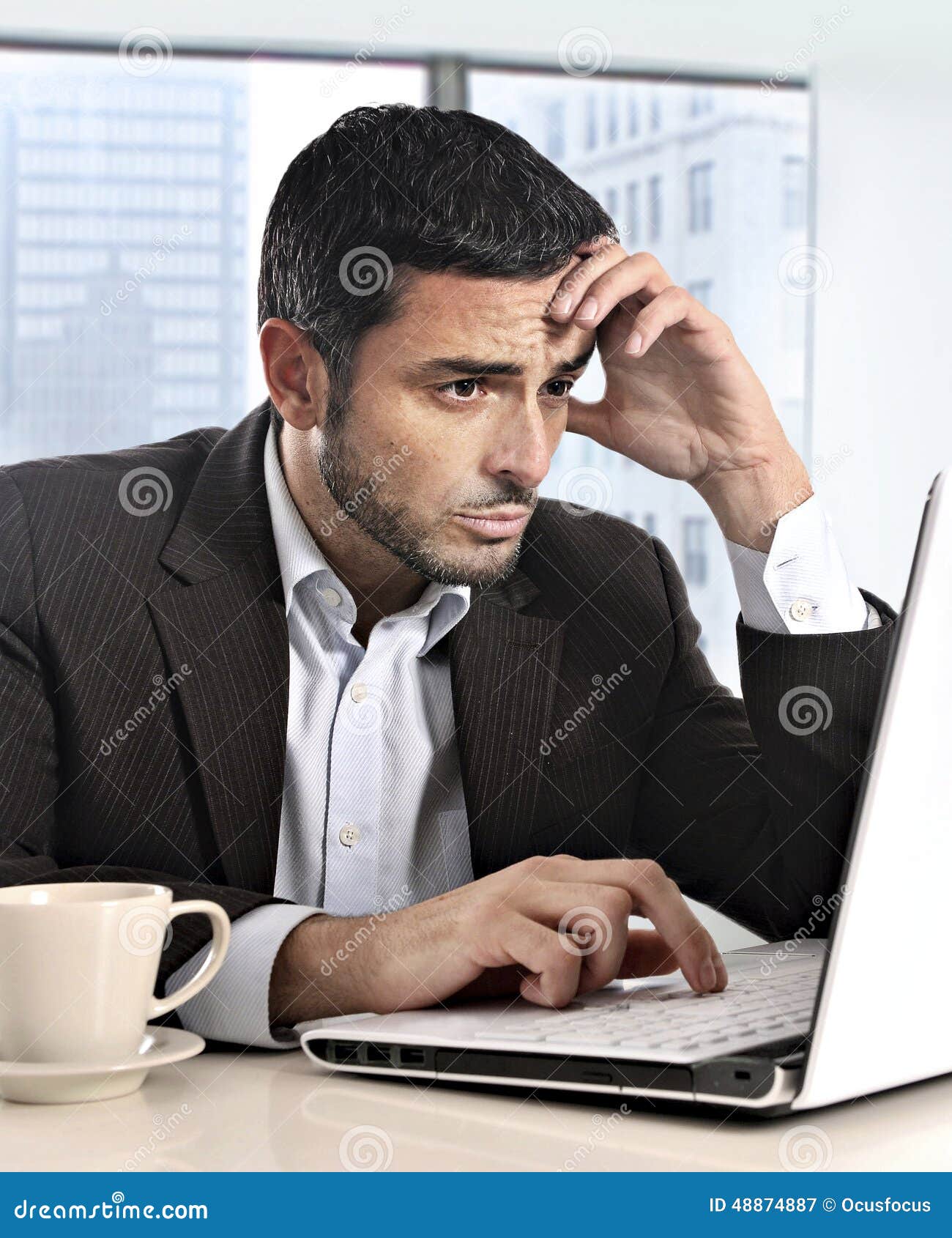 Attractive Hispanic Businessman Working with Computer Looking Stressed ...