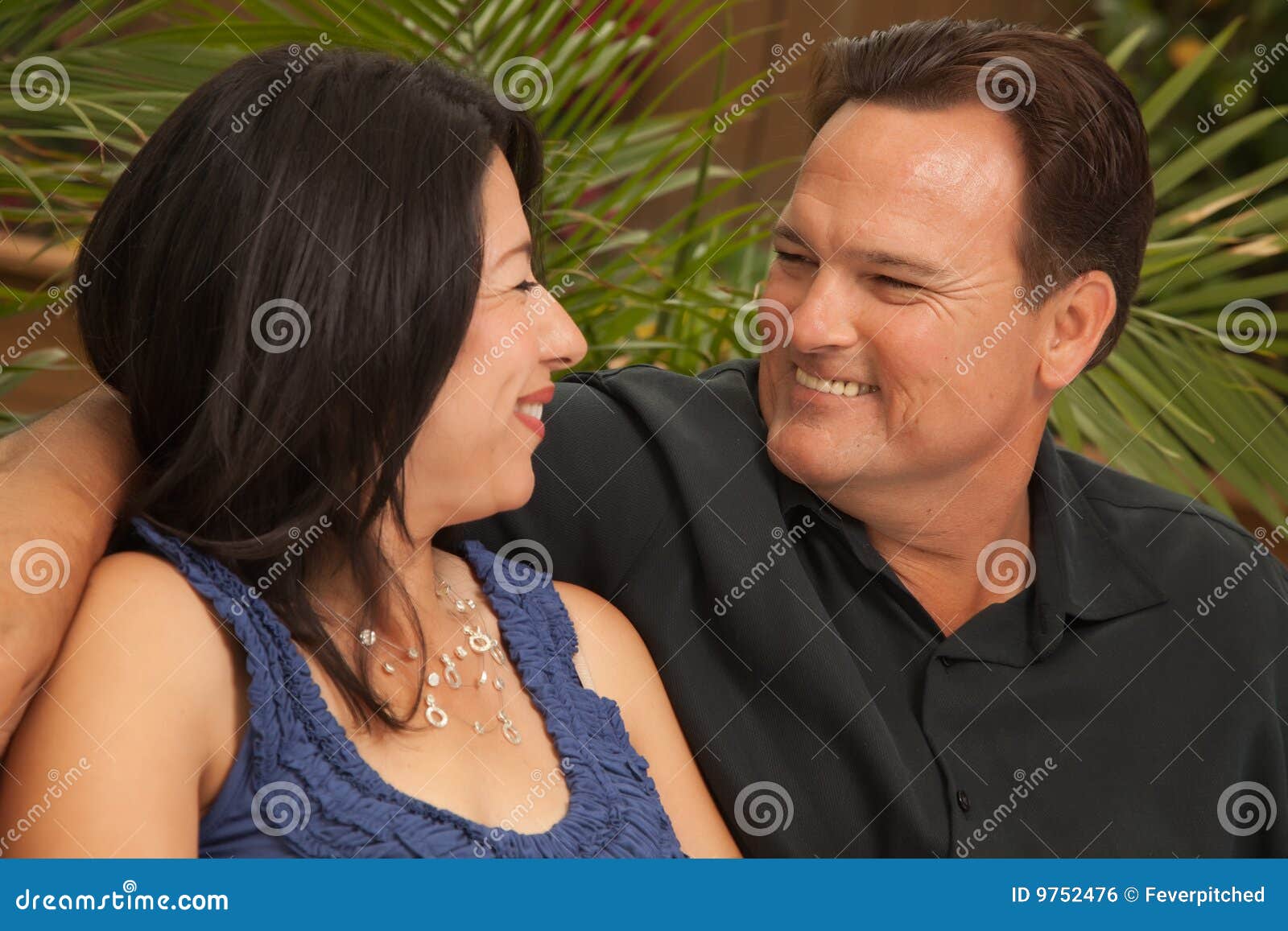 Attractive Hispanic and Caucasian Couple Stock Photo - Image of ...