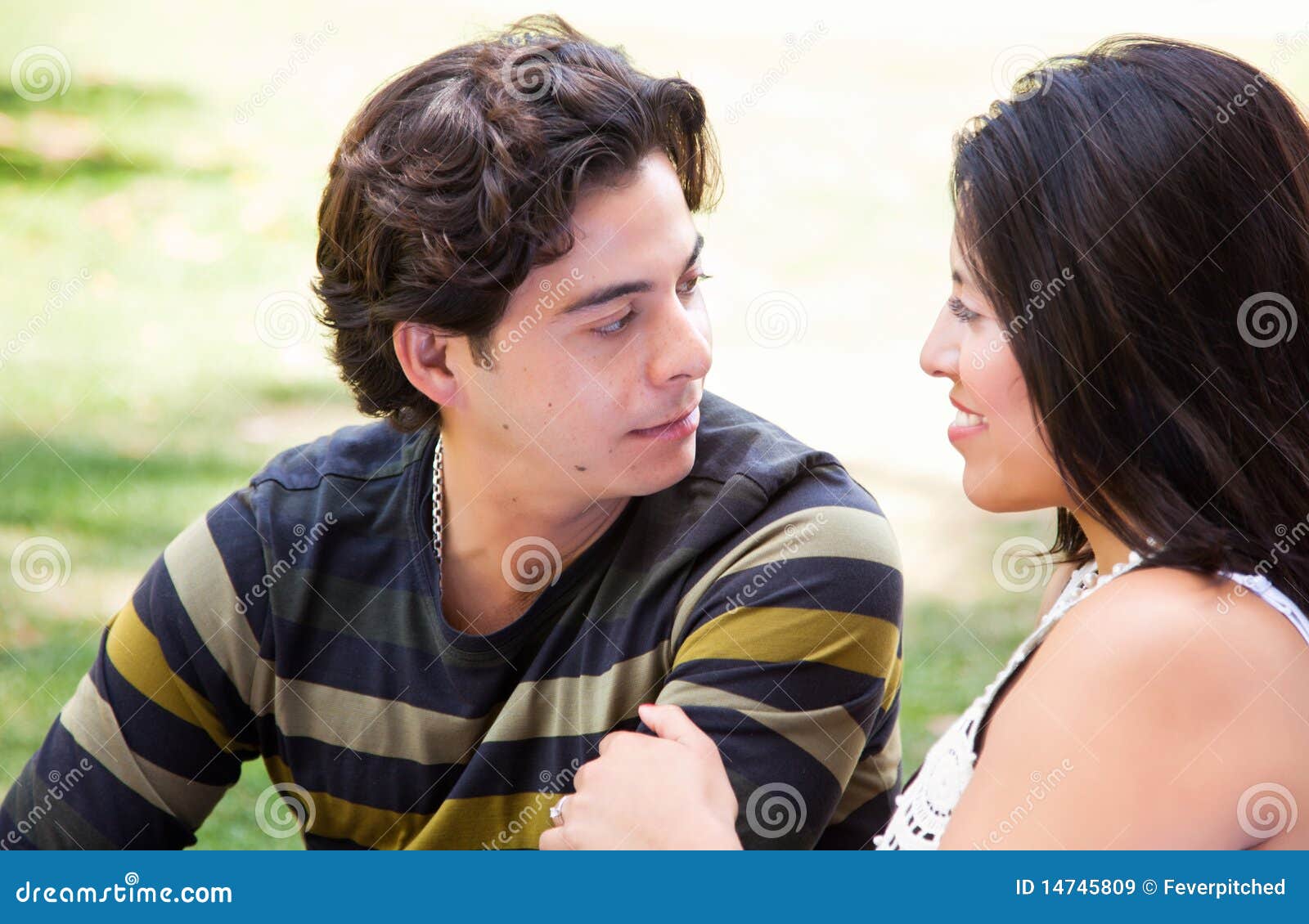 Attractive Hispanic Couple at the Park Stock Image - Image of affection ...