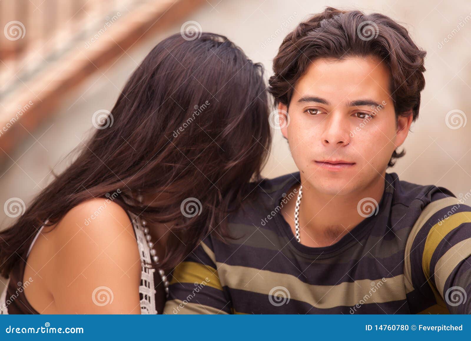 Attractive Hispanic Couple during a Serious Moment Stock Photo - Image ...