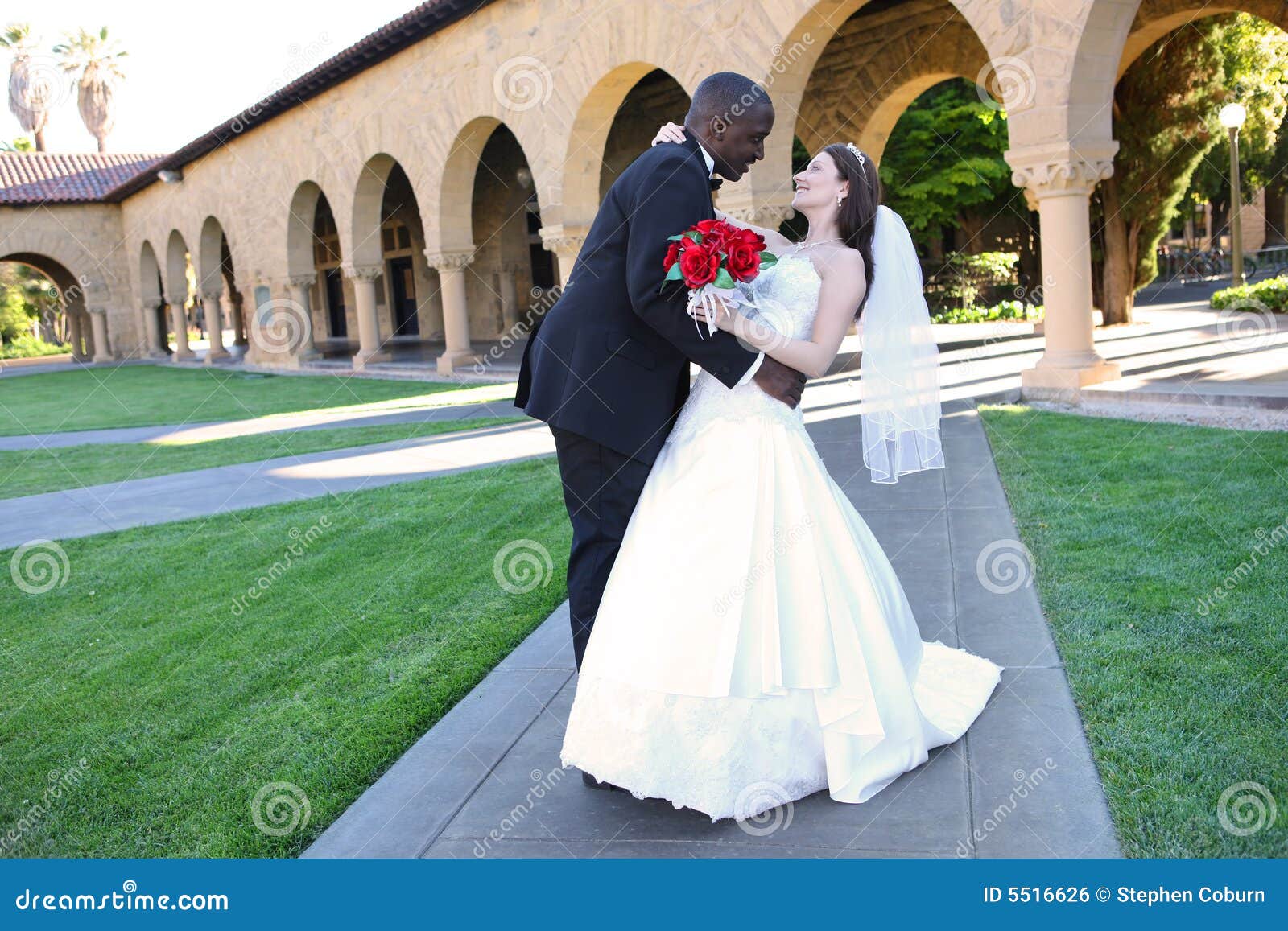 Attractive Interracial Wedding Couple At Church Royalty-Free Stock ...