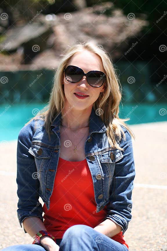 An Attractive Lady by the Pool Stock Image - Image of lounging ...