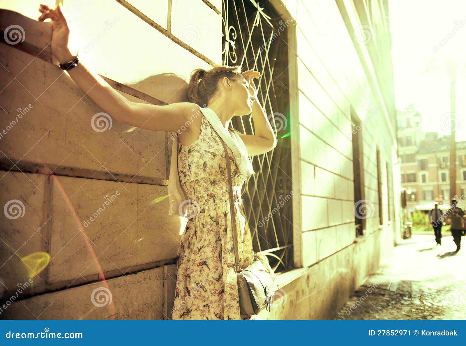Attractive lady sunbathing stock image. Image of building - 27852971