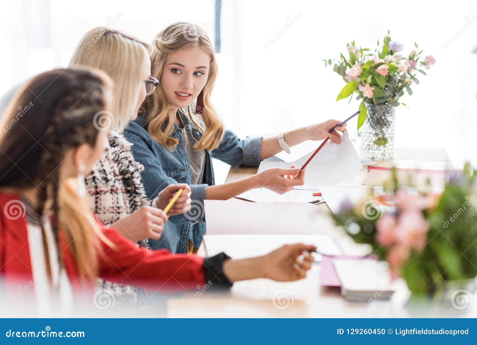 Attractive Magazine Editors Working with Documents Stock Photo - Image ...