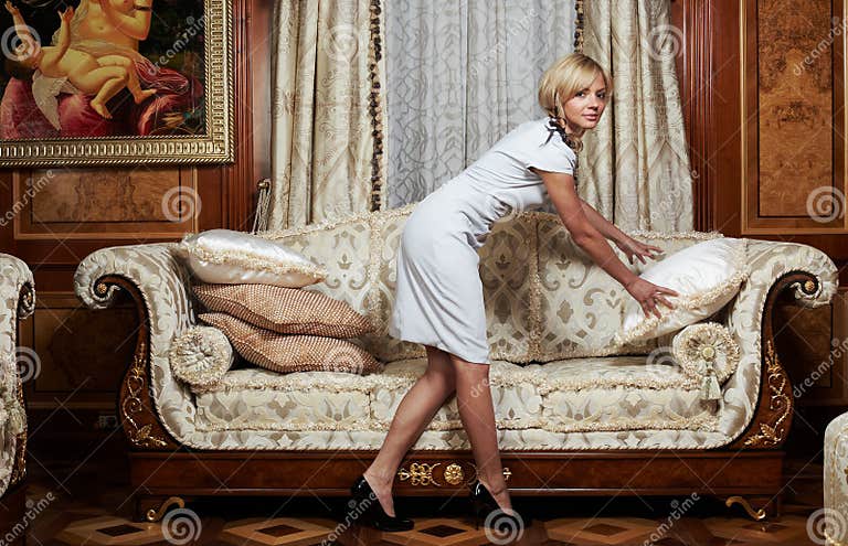 Attractive Maid Making a Sofa in Luxury Hotel Stock Image - Image of ...