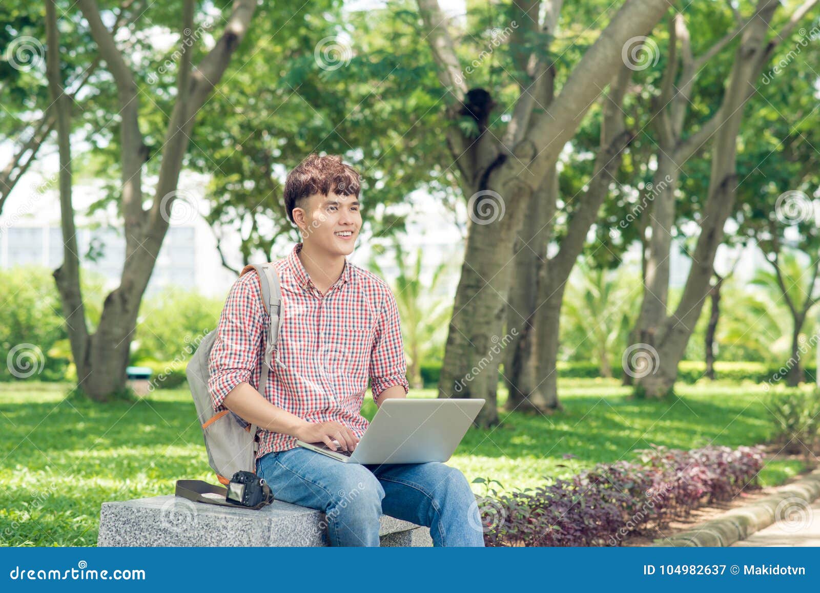 Attractive Male Asian Student is Using Computer in University`s Stock ...