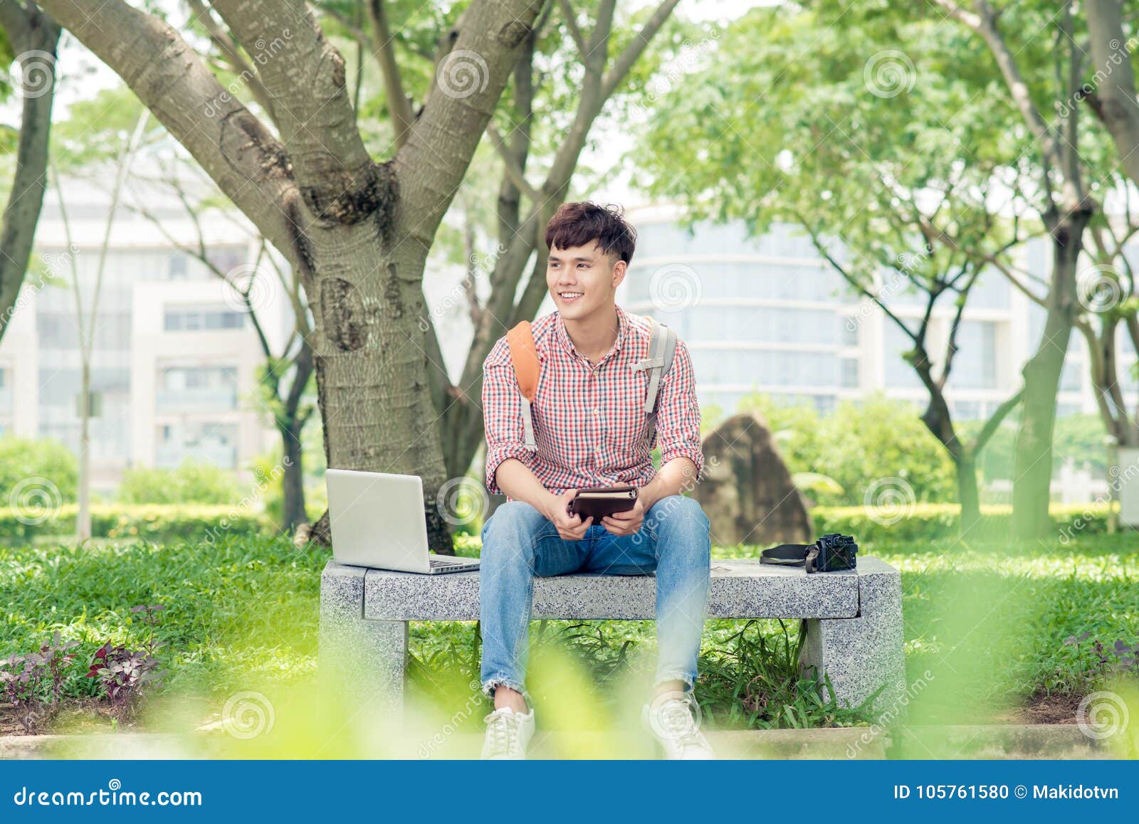 Attractive Male Asian Student is Using Computer in University`s Stock ...