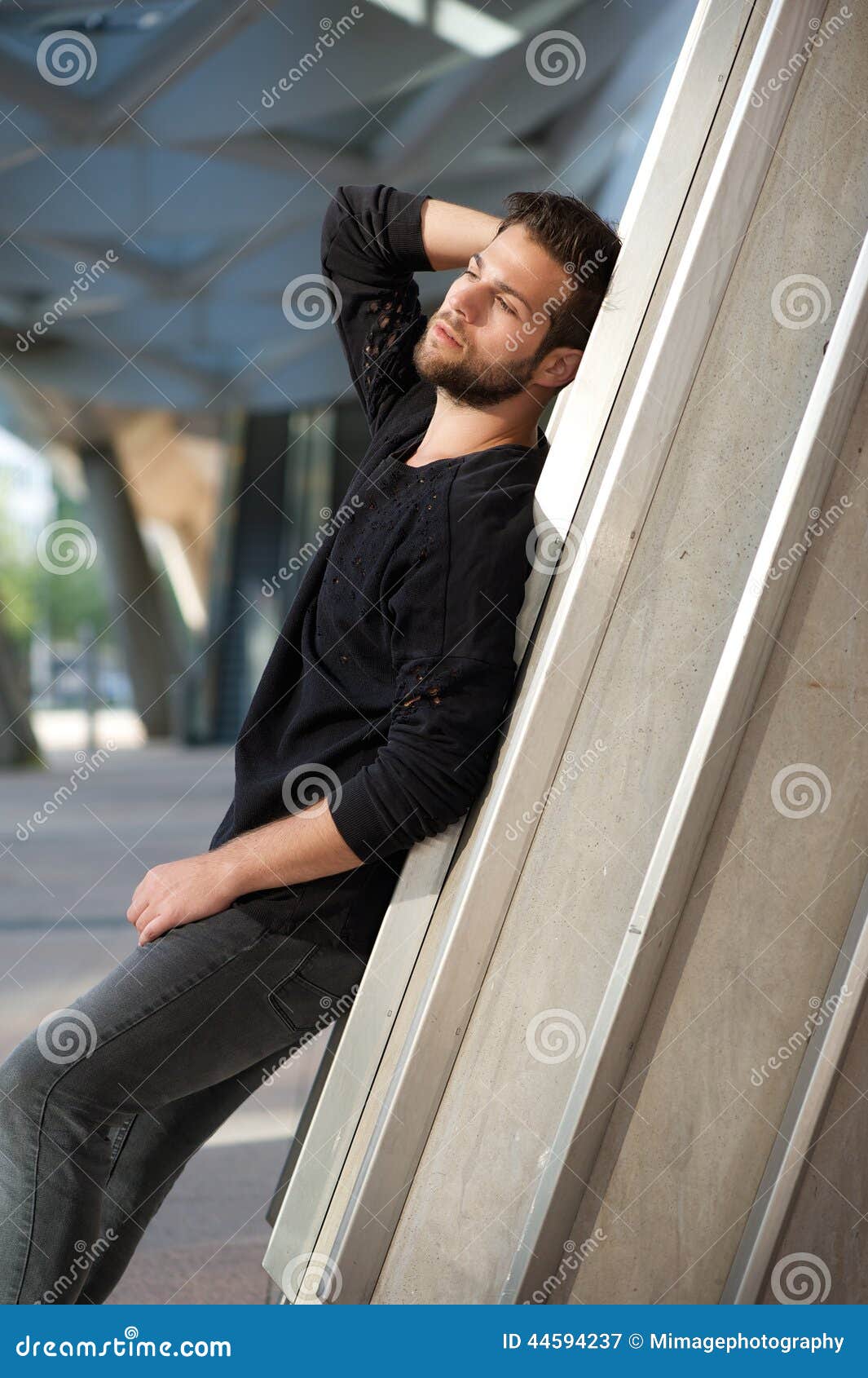 Attractive Male Fashion Model With Beard Posing Outdoors Stock Image