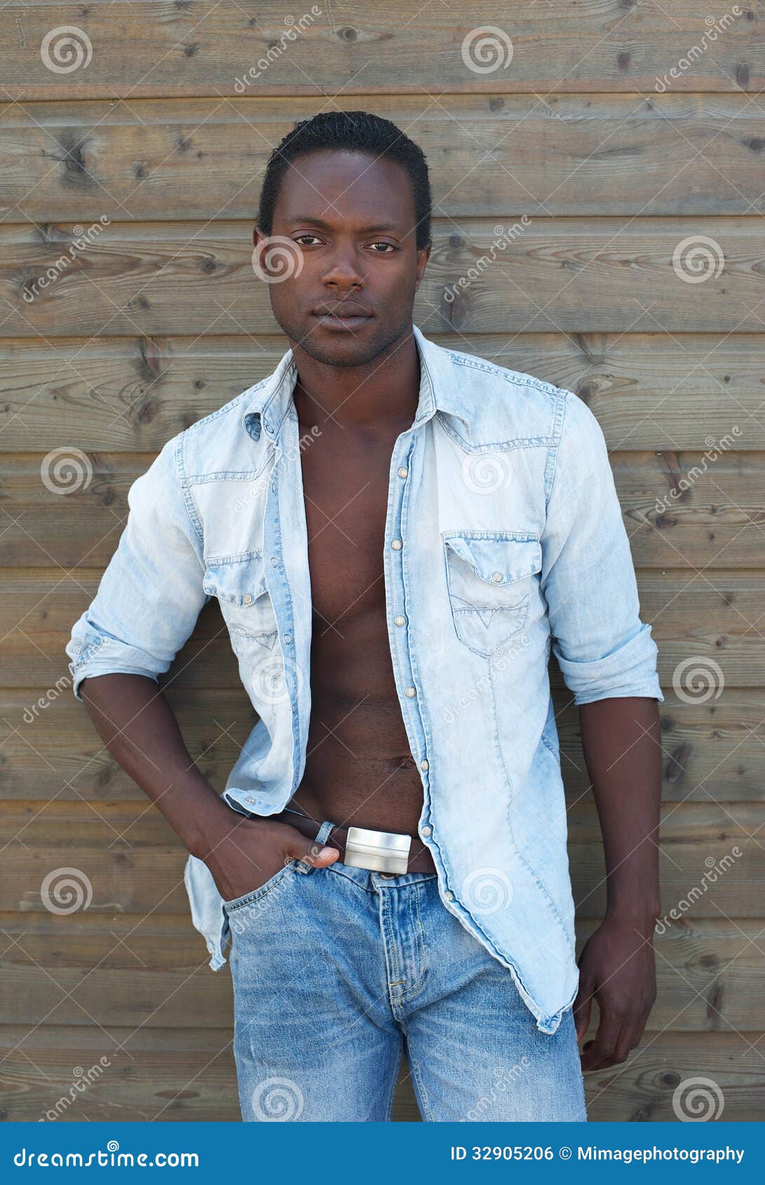 Attractive Male Fashion Model Standing Outdoors Stock Photo - Image of ...