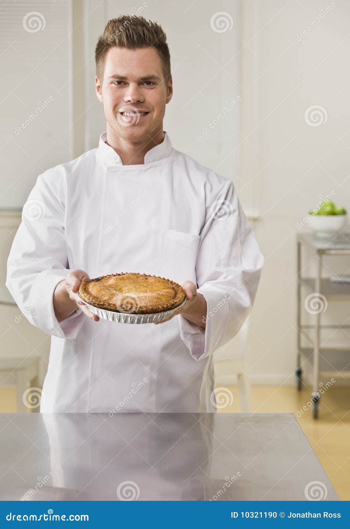 Attractive male with pie. stock photo. Image of pastry - 10321190