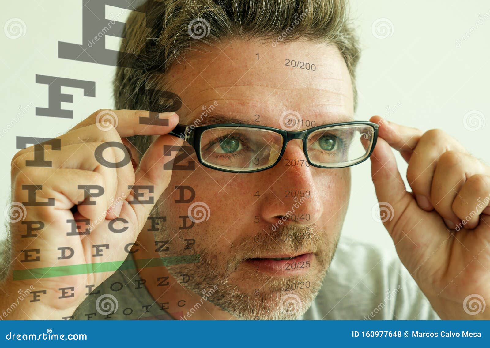 Attractive Man Checking Vision Trying Glasses at Optometrist . Guy on ...