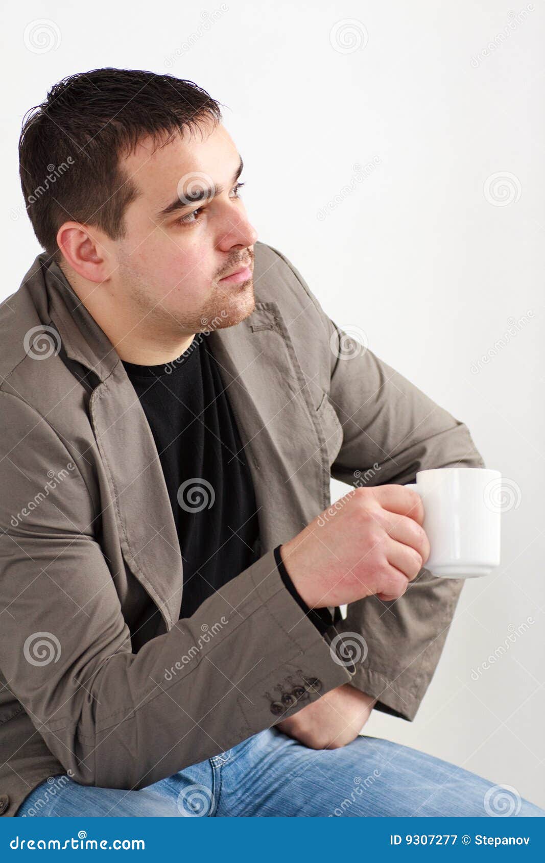 Attractive man with cup stock image. Image of fashion - 9307277