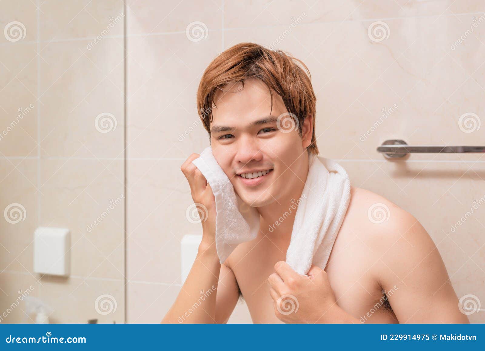 Attractive Man Drying His Face in the Mirror Stock Image - Image of ...