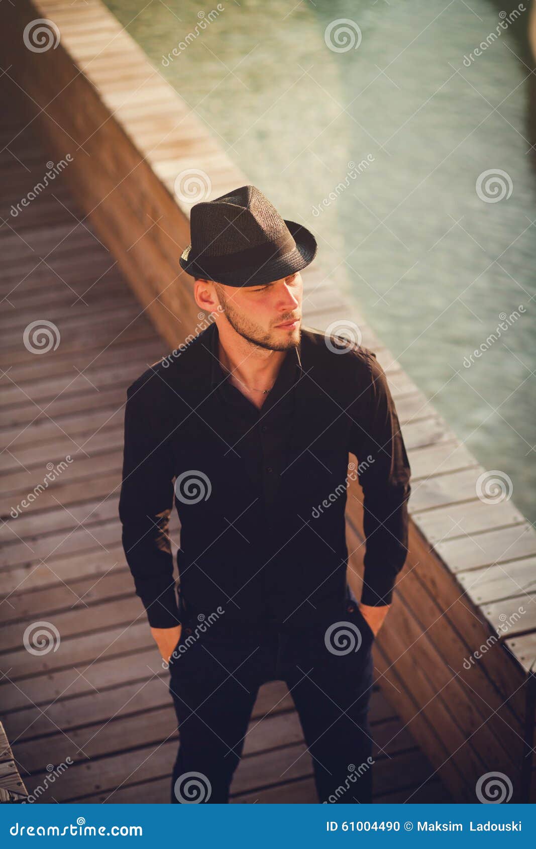 Attractive Man in Hat Standing Near the Pool Stock Photo - Image of ...