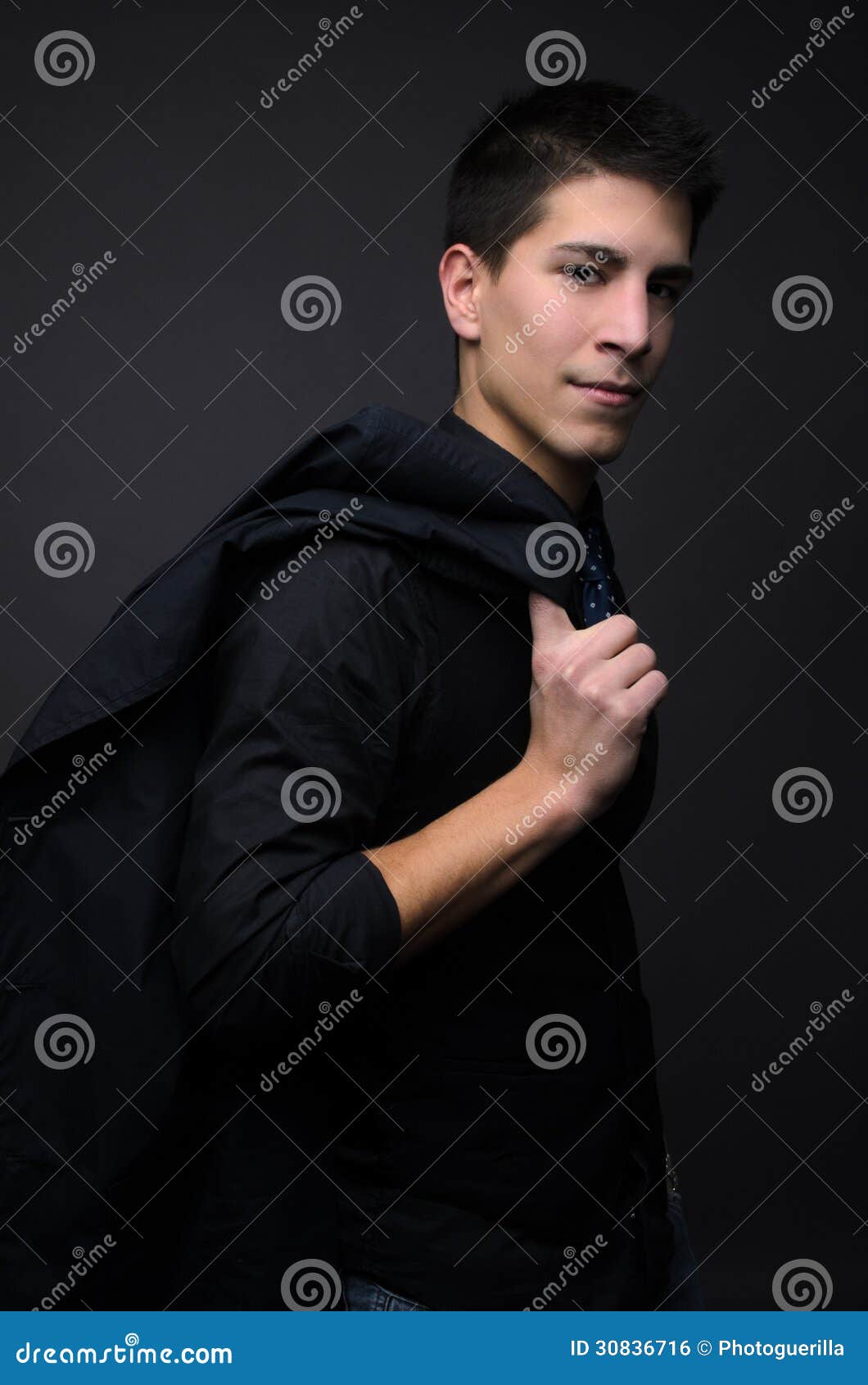 Attractive Man Holding a Jacket Stock Photo - Image of attractive ...