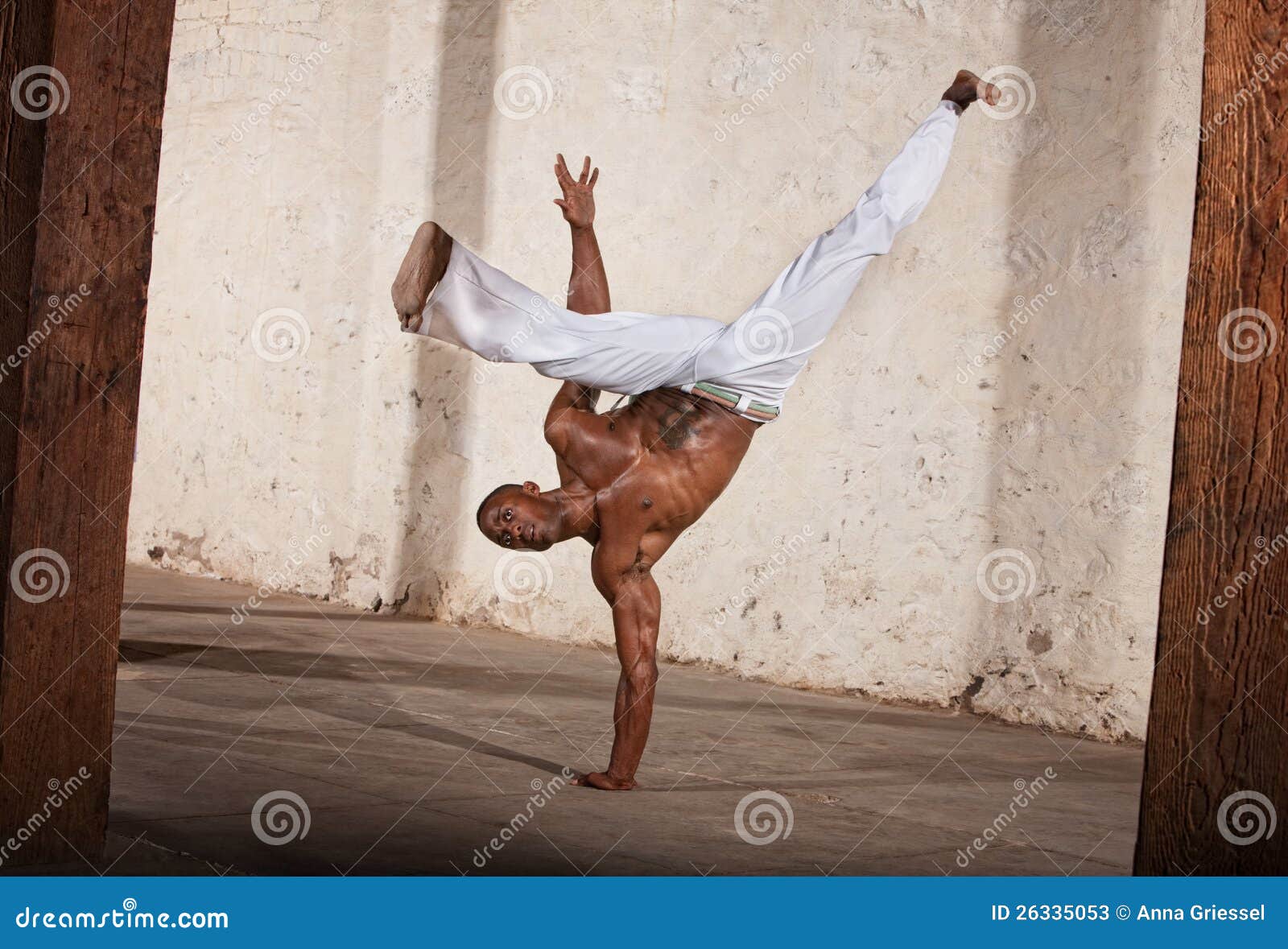 Attractive Man Kicking stock image. Image of performance - 26335053