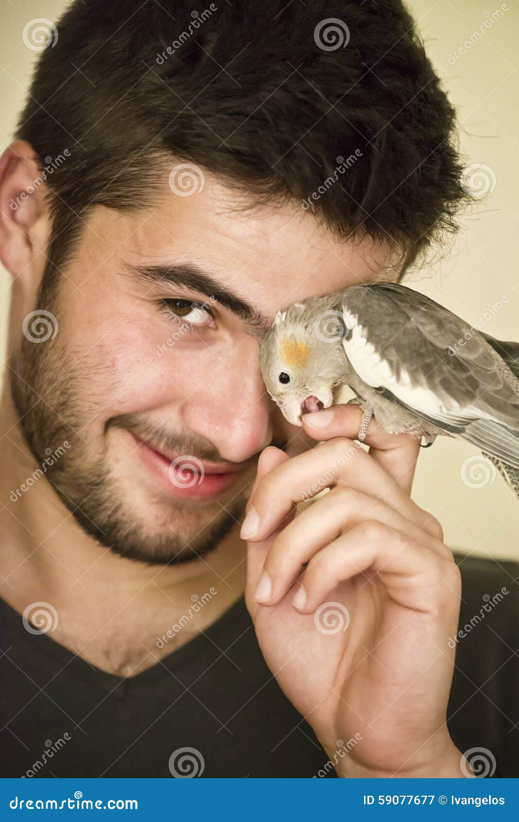Attractive Man Playing with His Parrot Stock Image - Image of ...