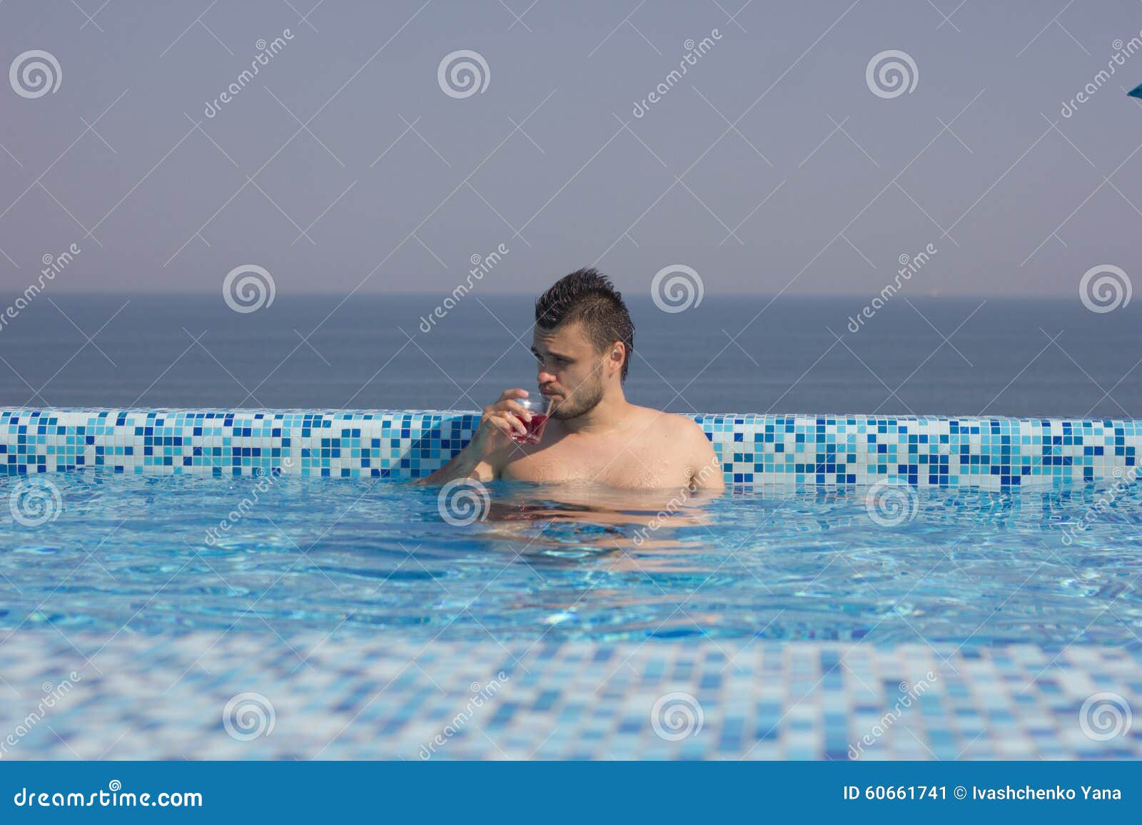 Attractive Man in the Pool with a Cocktail. Stock Image - Image of blue ...