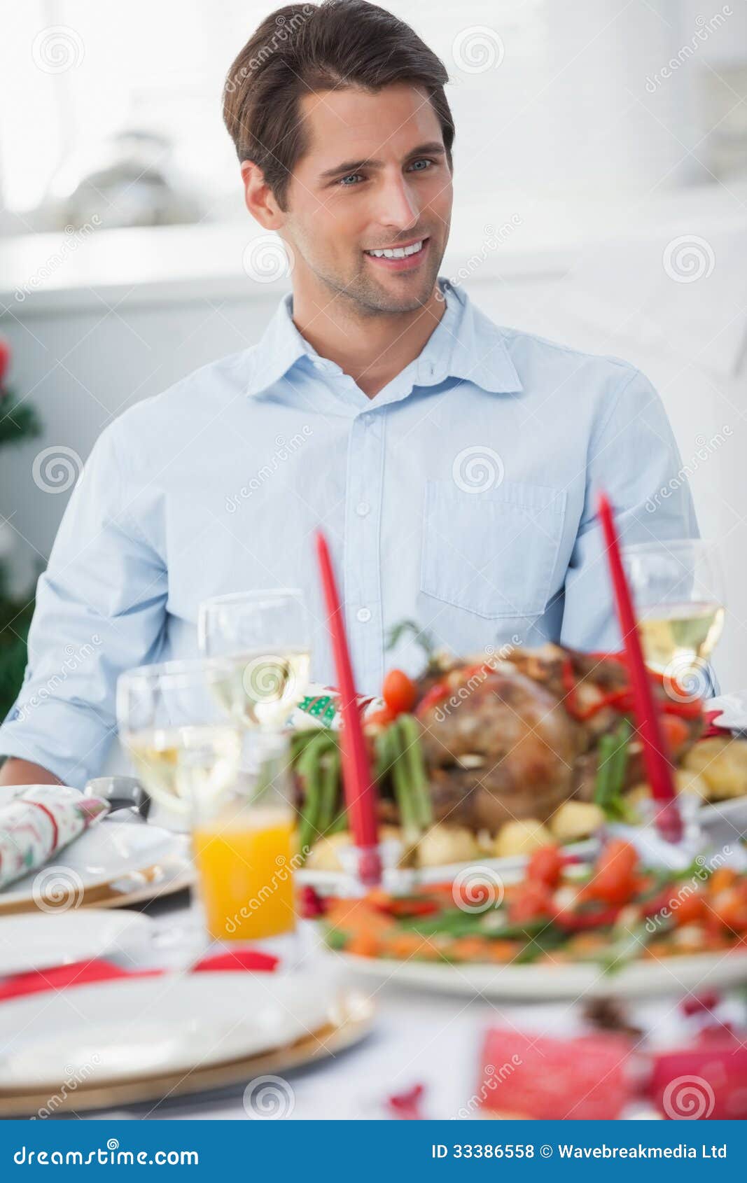 Attractive Man Sitting at Table for Christmas Dinner Stock Photo ...
