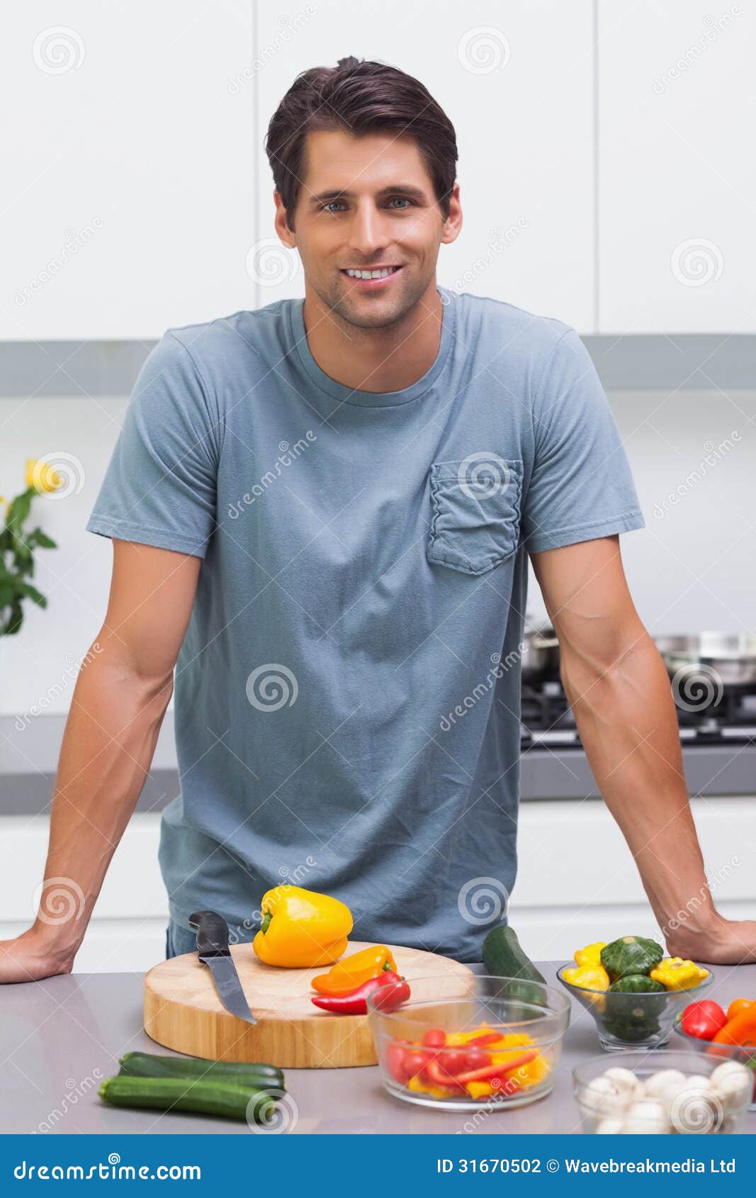 Attractive Man Standing in His Kitchen Stock Photo - Image of counter ...