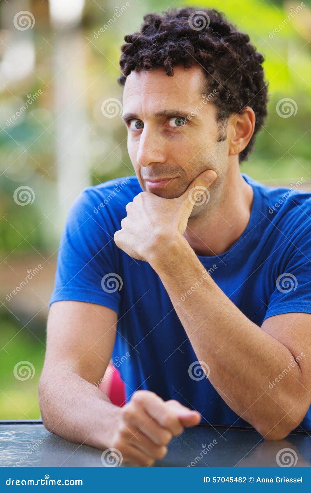 Attractive Man Staring stock photo. Image of sitting - 57045482
