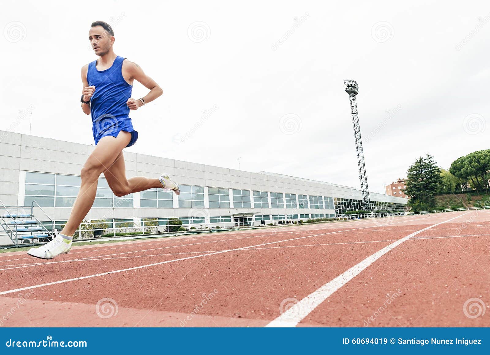 Attractive Man Track Athlete Running on Track. Stock Image - Image of ...
