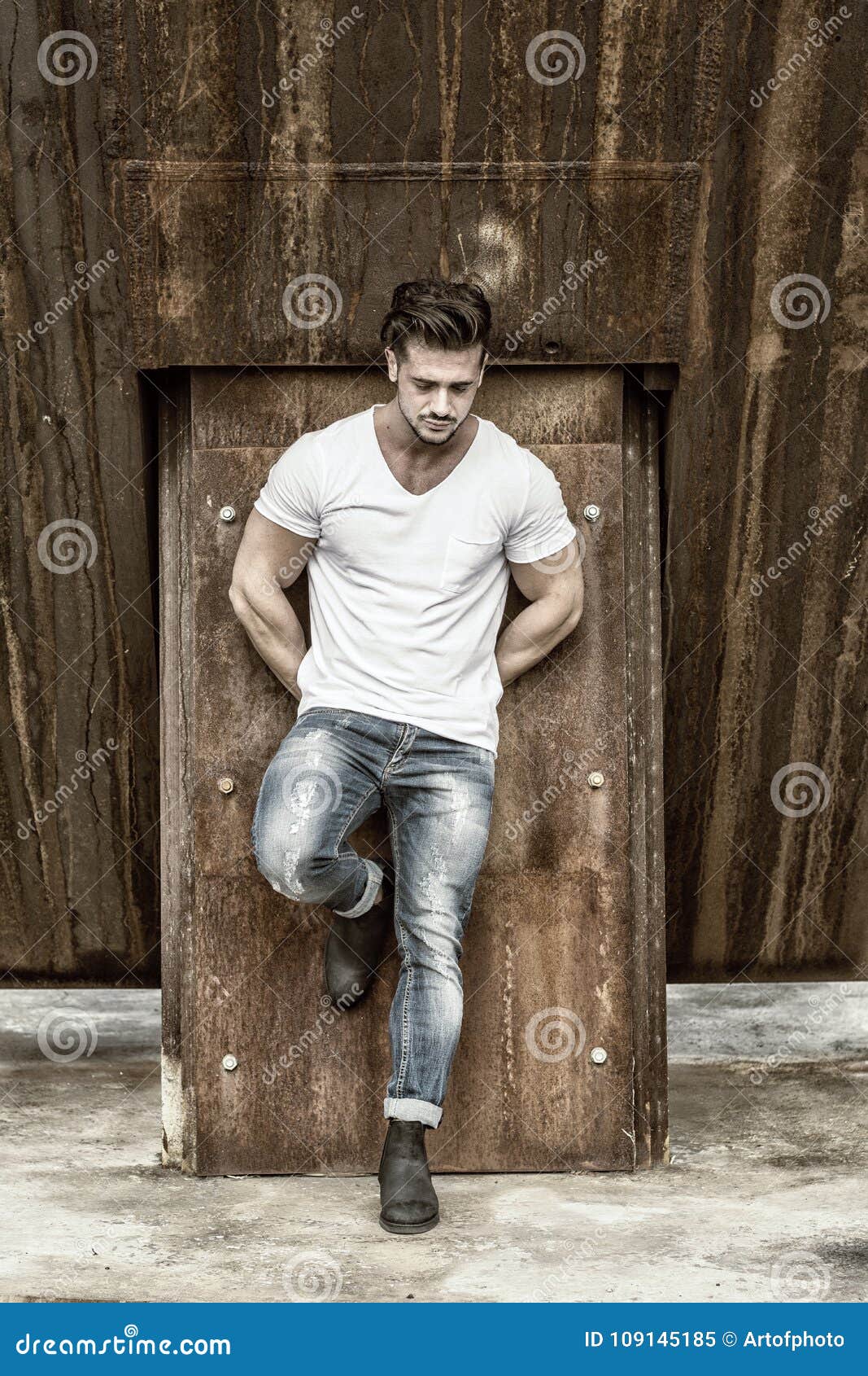 Man in Urban Setting in Front of Big Metal Structure Stock Image ...