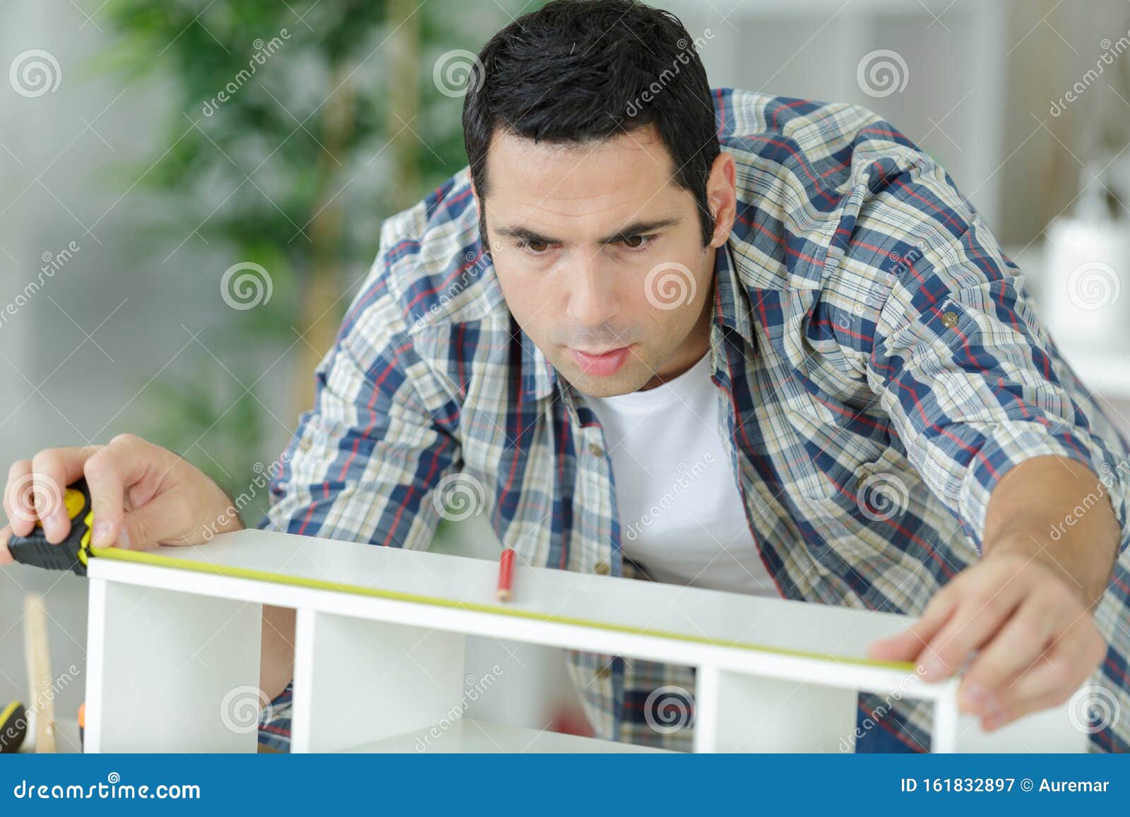 Attractive Man Using Tape Measure Stock Image - Image of drilling, copy ...