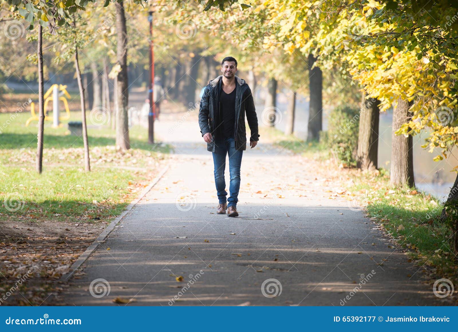 Attractive Man Walking in Autumn Forest Stock Image - Image of ...