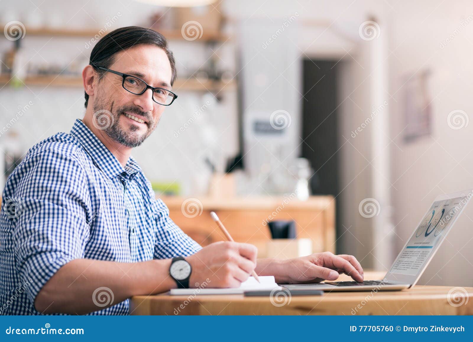 Attractive Man Writing Something Down Stock Photo - Image of self, male ...