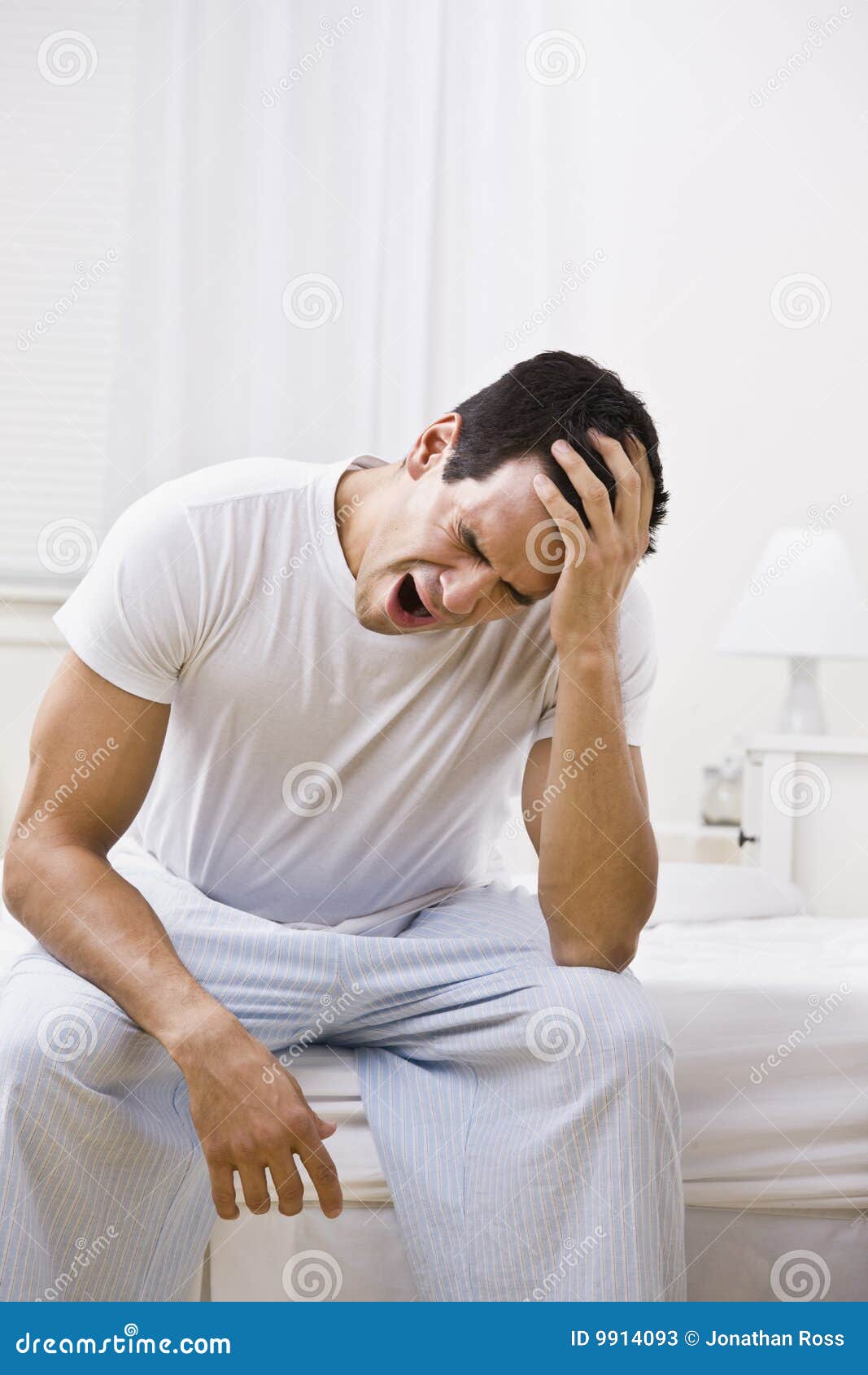 Attractive Man Yawning and Looking Sleepy Stock Image - Image of ...