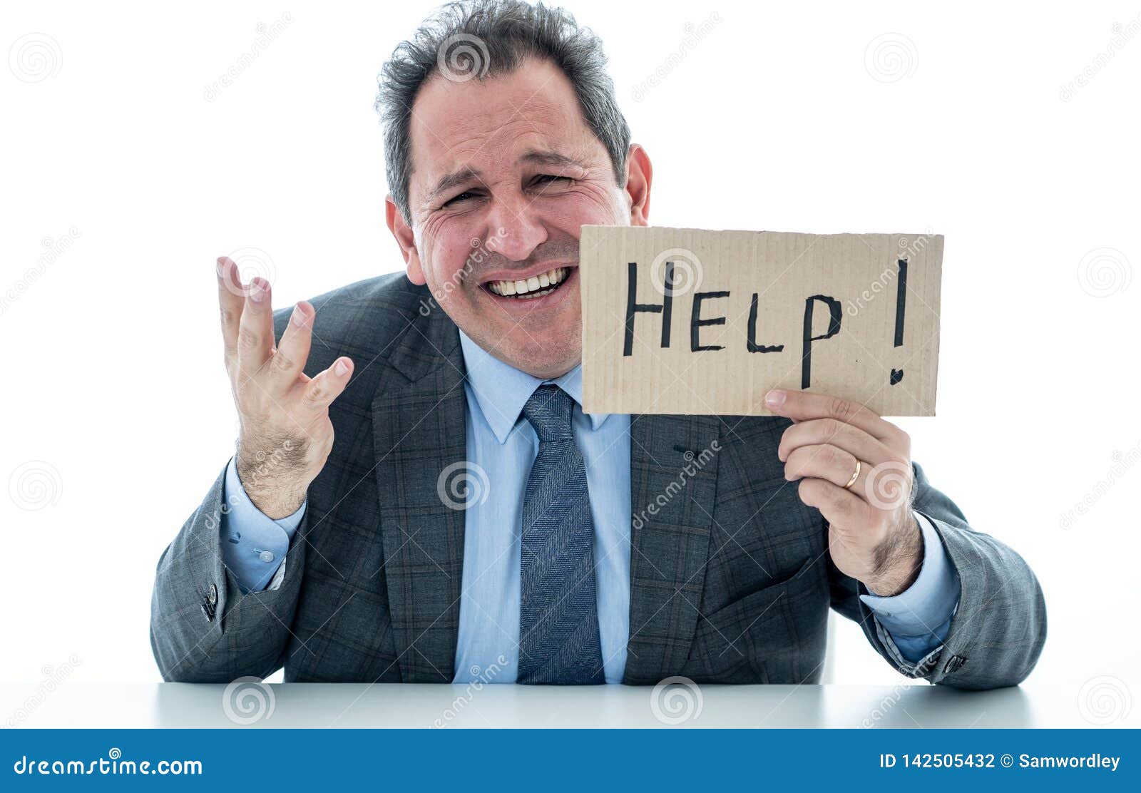 Attractive Mature Businessman Overwhelmed And Tired Holding A Help Sign