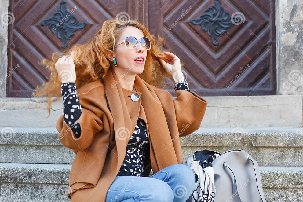 Attractive Middle Aged White Caucasian Woman With Waved Curly Red Hair