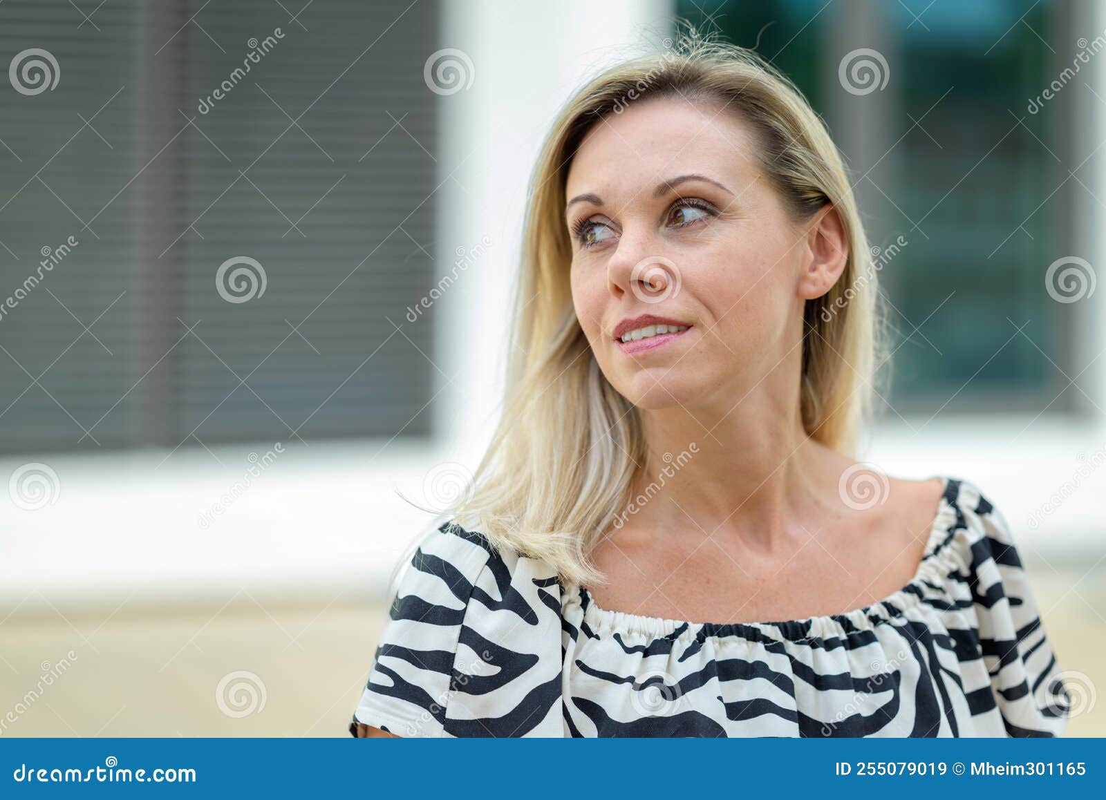 Attractive Middle Aged Woman Looking Back Over Her Shoulder Stock Image ...