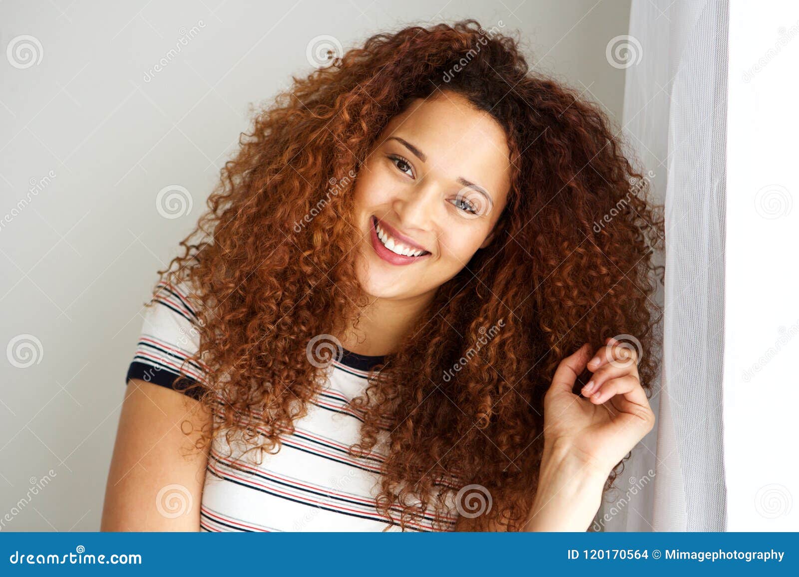 Attractive Mixed Race Woman with Curly Hair Smiling Stock Photo - Image ... Attractive Mixed Race Woman with Curly Hair Smiling Stock Photo - Image ...