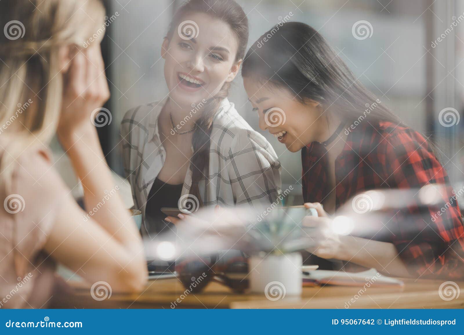 Attractive Multicultural Women on Coffee Break in Cafe Stock Photo ...