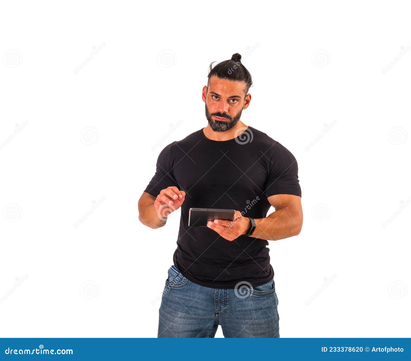 Attractive Muscular Man Using Electronic Tablet in Studio Stock Photo ...