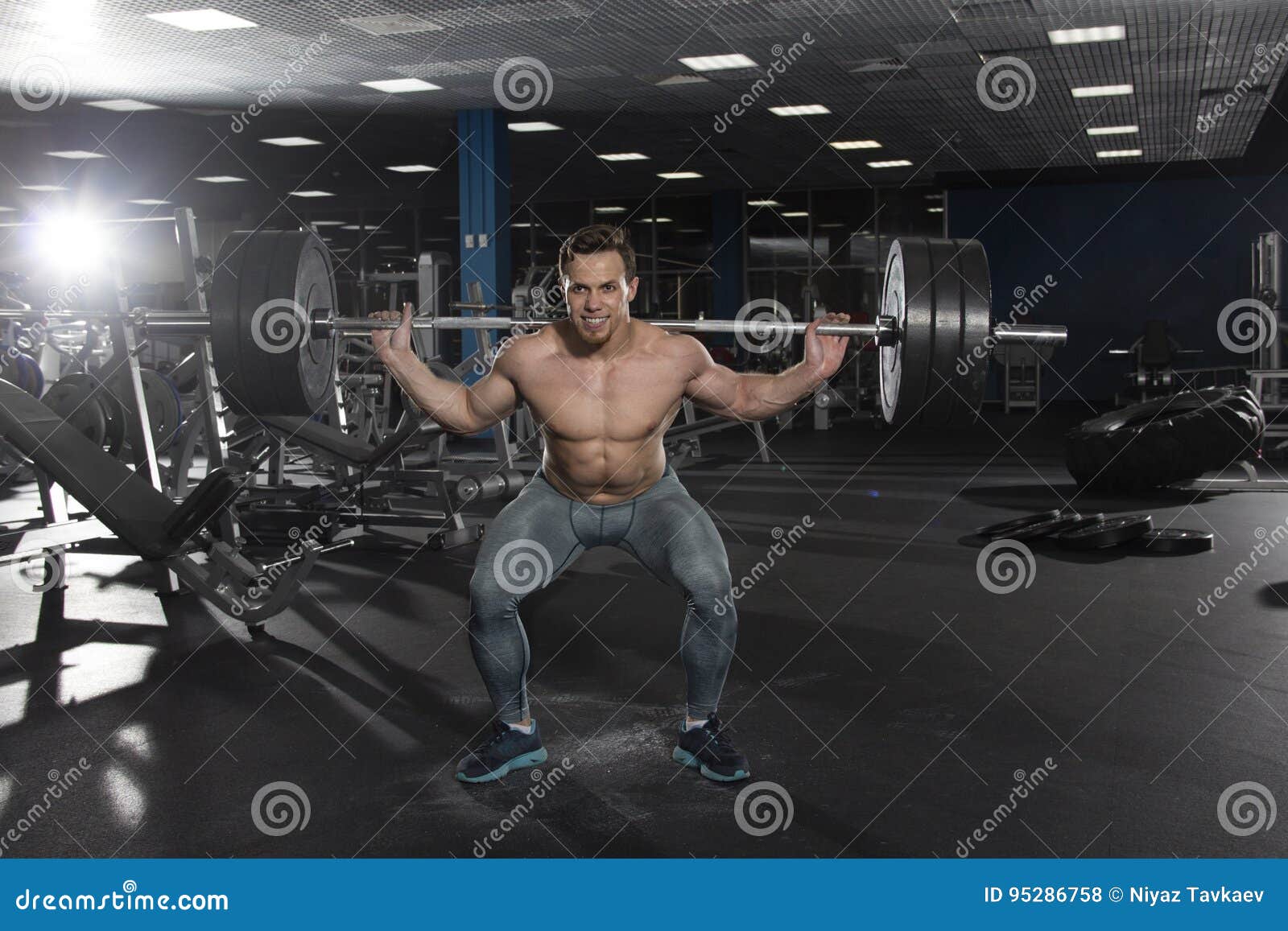 Attractive Muscular Shirtless Athlete Doing Heavy Squat Exercis Stock ...