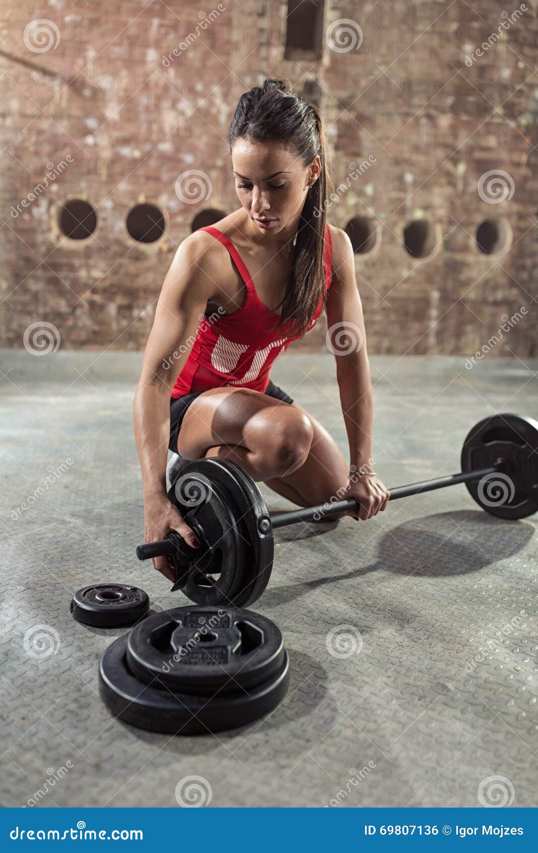Attractive muscular woman stock photo. Image of cardio - 69807136