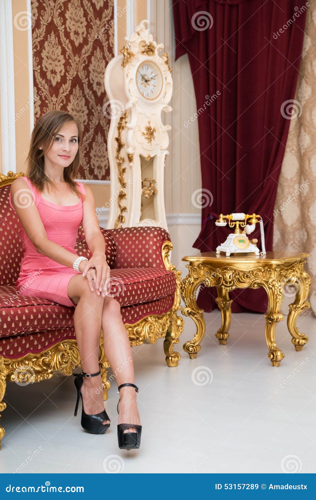 Attractive Nicely Dressed Young Girl Sitting at Sofa Stock Image ...